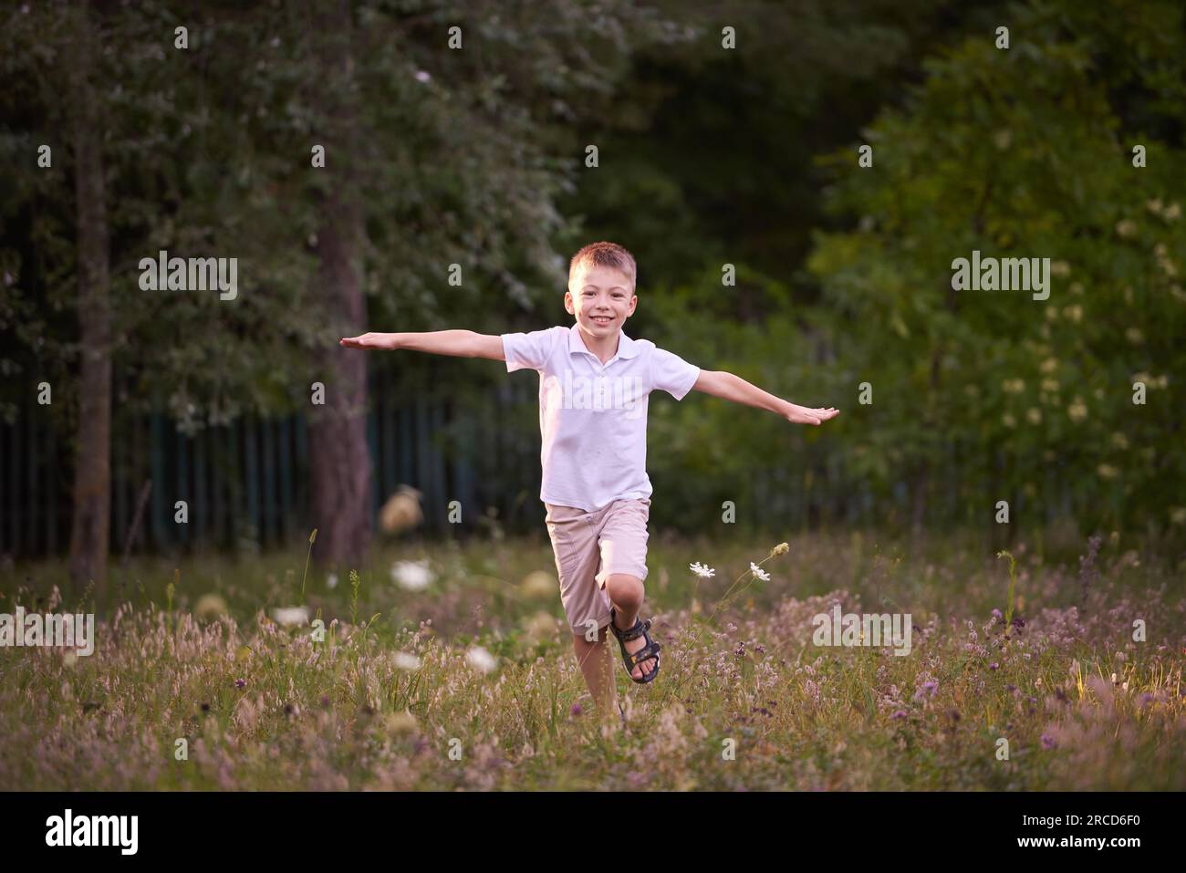 Boy child arms wide open hi-res stock photography and images - Alamy