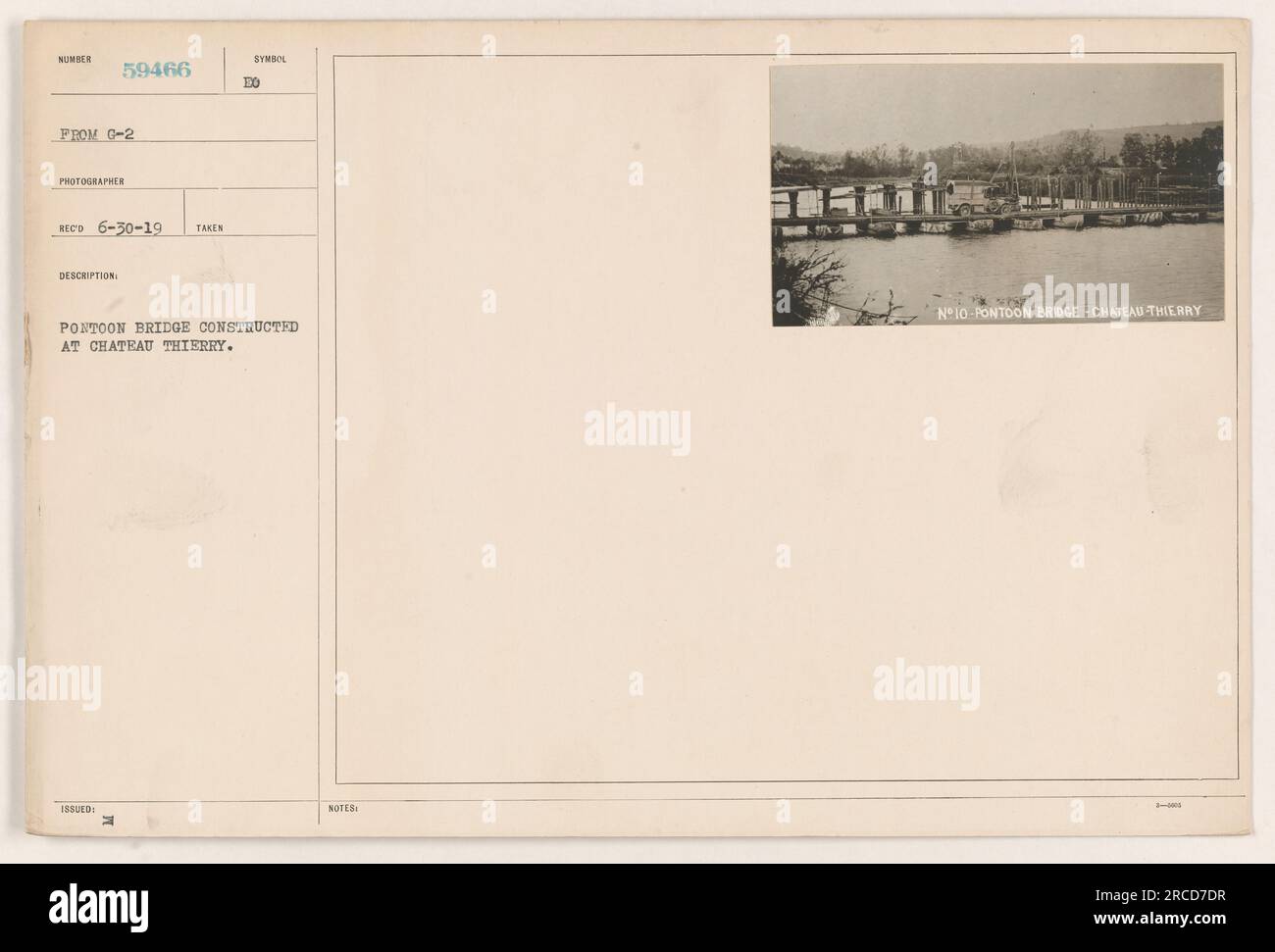 American soldiers construct a pontoon bridge at Chateau Thierry during ...