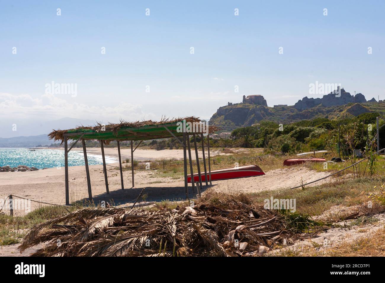 The beach at Roccella Ionica, Calabria, Italy, with the Castello Carafa ...