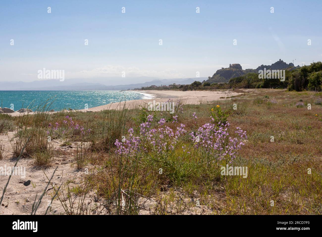 The beach at Roccella Ionica, Calabria, Italy, with the Castello Carafa ...