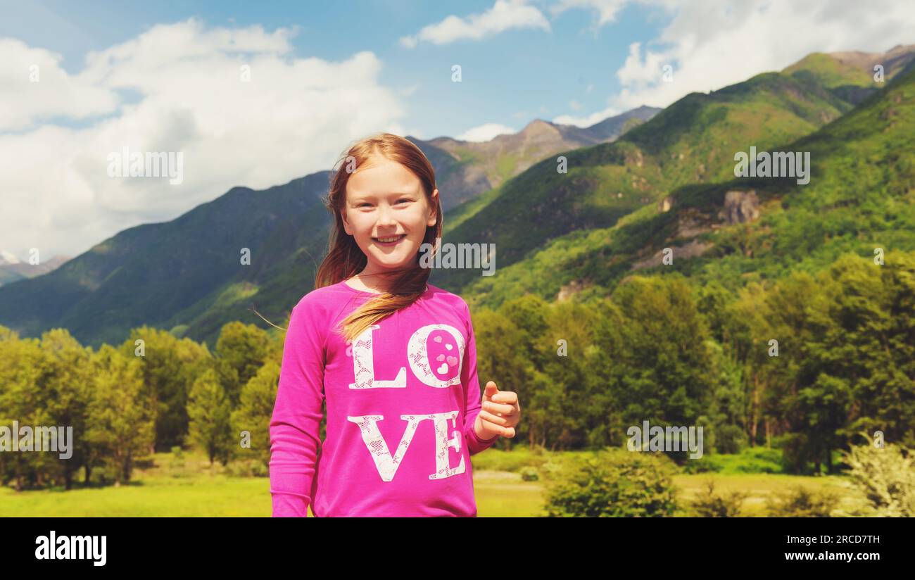 Cute little girl hiking in swiss Alps. Image taken in Simplon pass ...