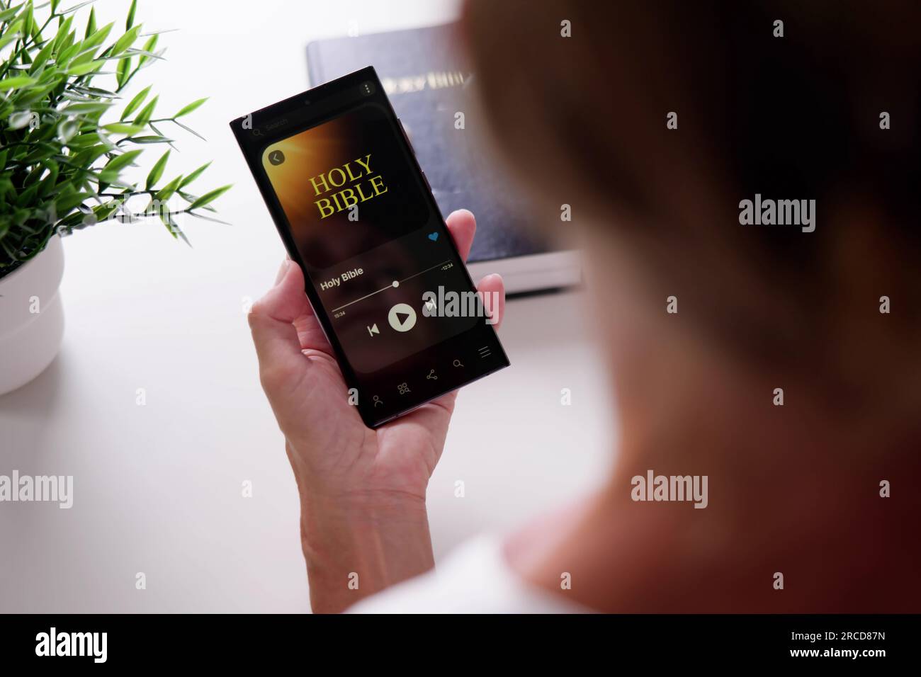 Christian Woman Reading Bible Book On Phone And Praying Stock Photo - Alamy