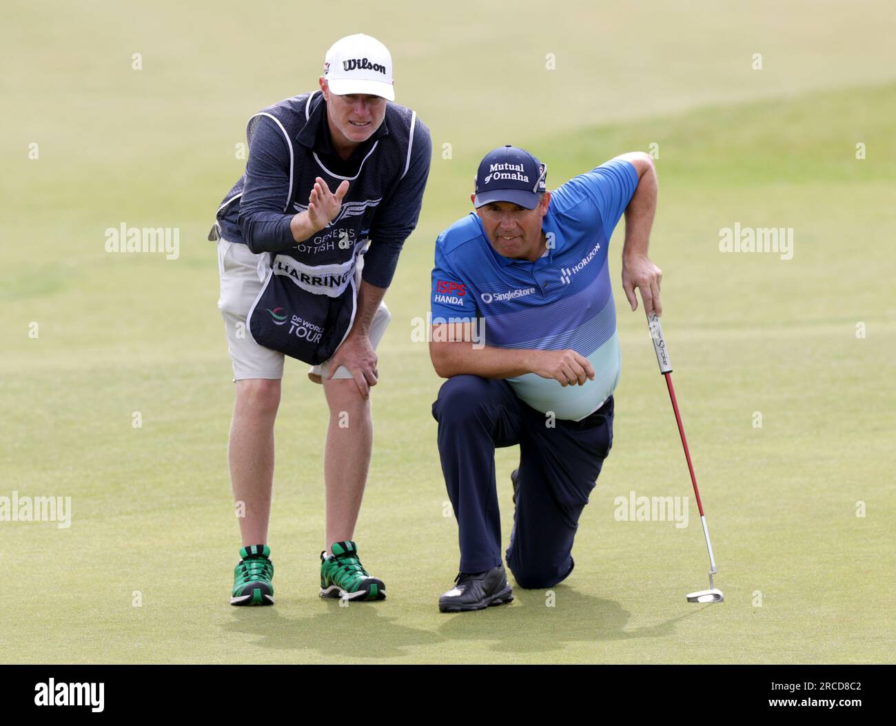 Padraig Harrington and caddy on the second green during day two of the ...