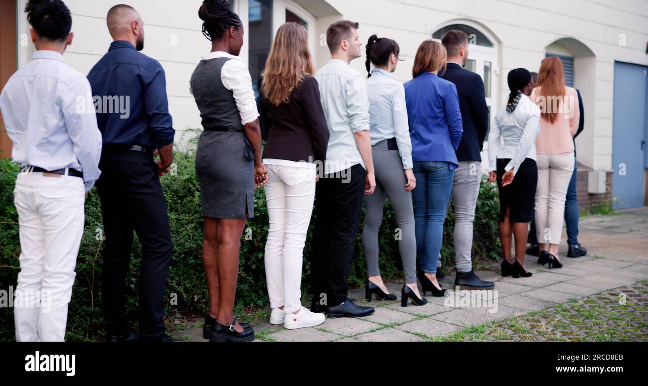 Queue Outdoors. Business People Waiting In Line Stock Photo - Alamy