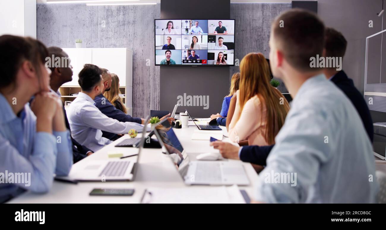 Online Video Conference Call In Boardroom Meeting Stock Photo - Alamy