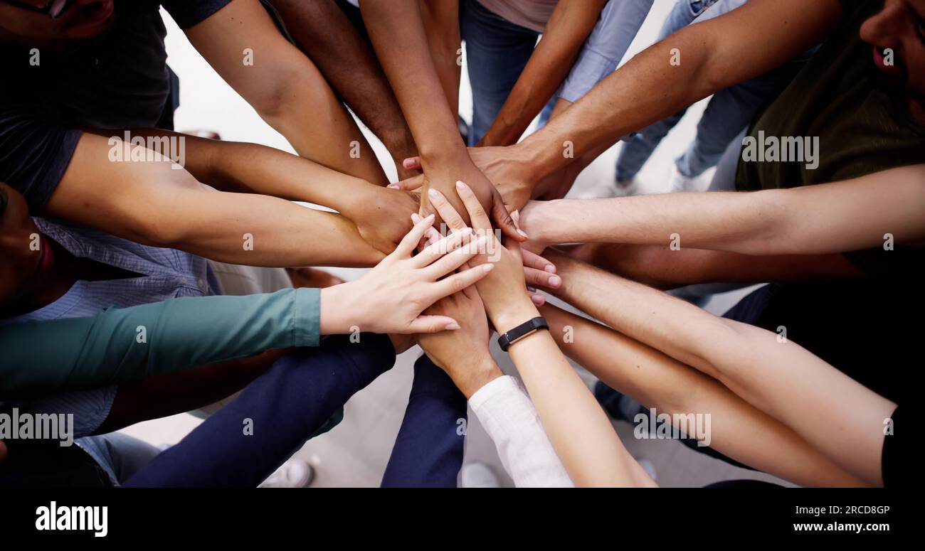 Business Team Huddle. Diverse Friends Hands Commitment Stock Photo - Alamy