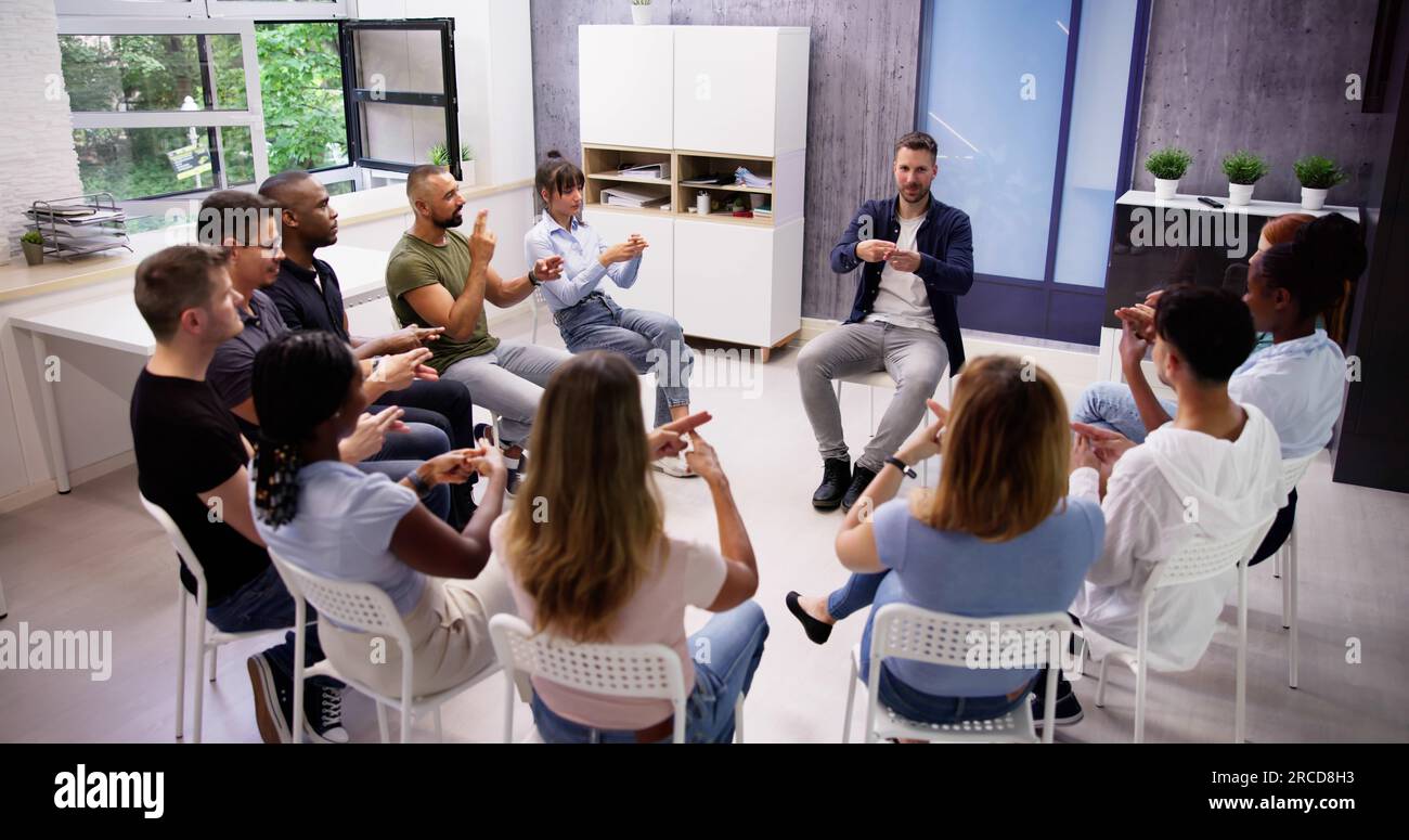 Sign Language Class For People With Disability Stock Photo - Alamy