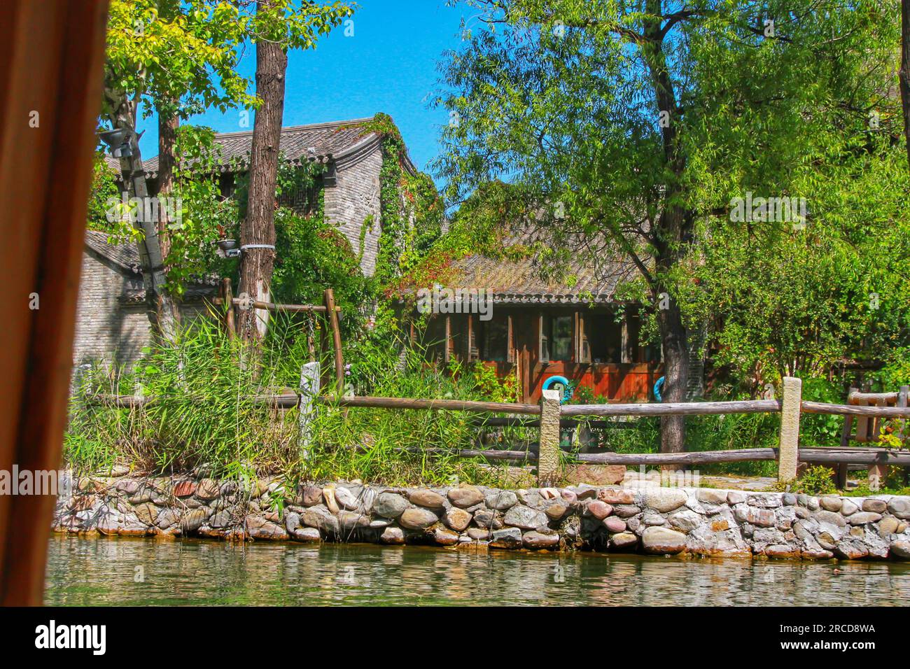 Discover the harmonious blend of a beautiful river, verdant trees, and ...