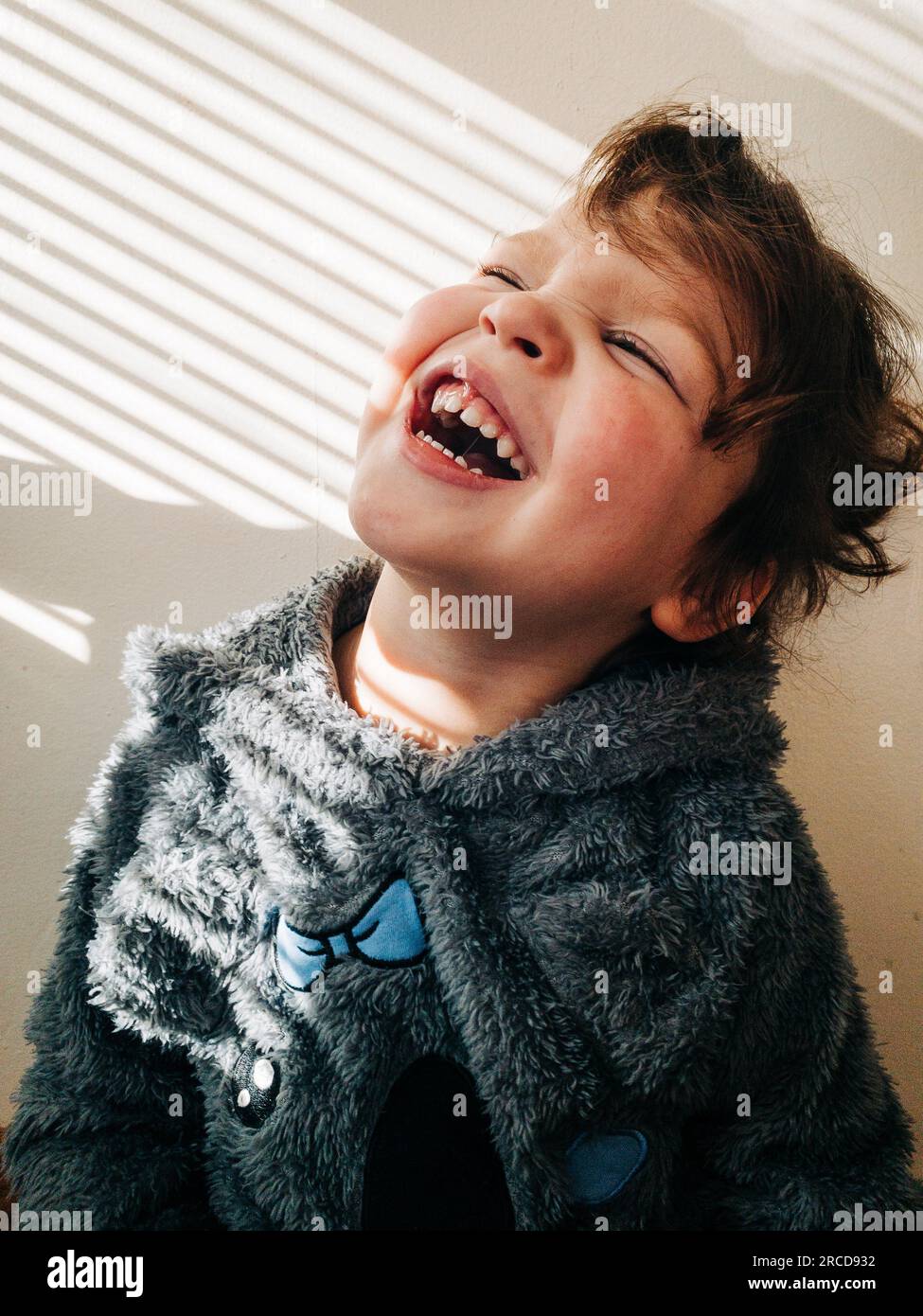 Girl laughing out loud Stock Photo - Alamy