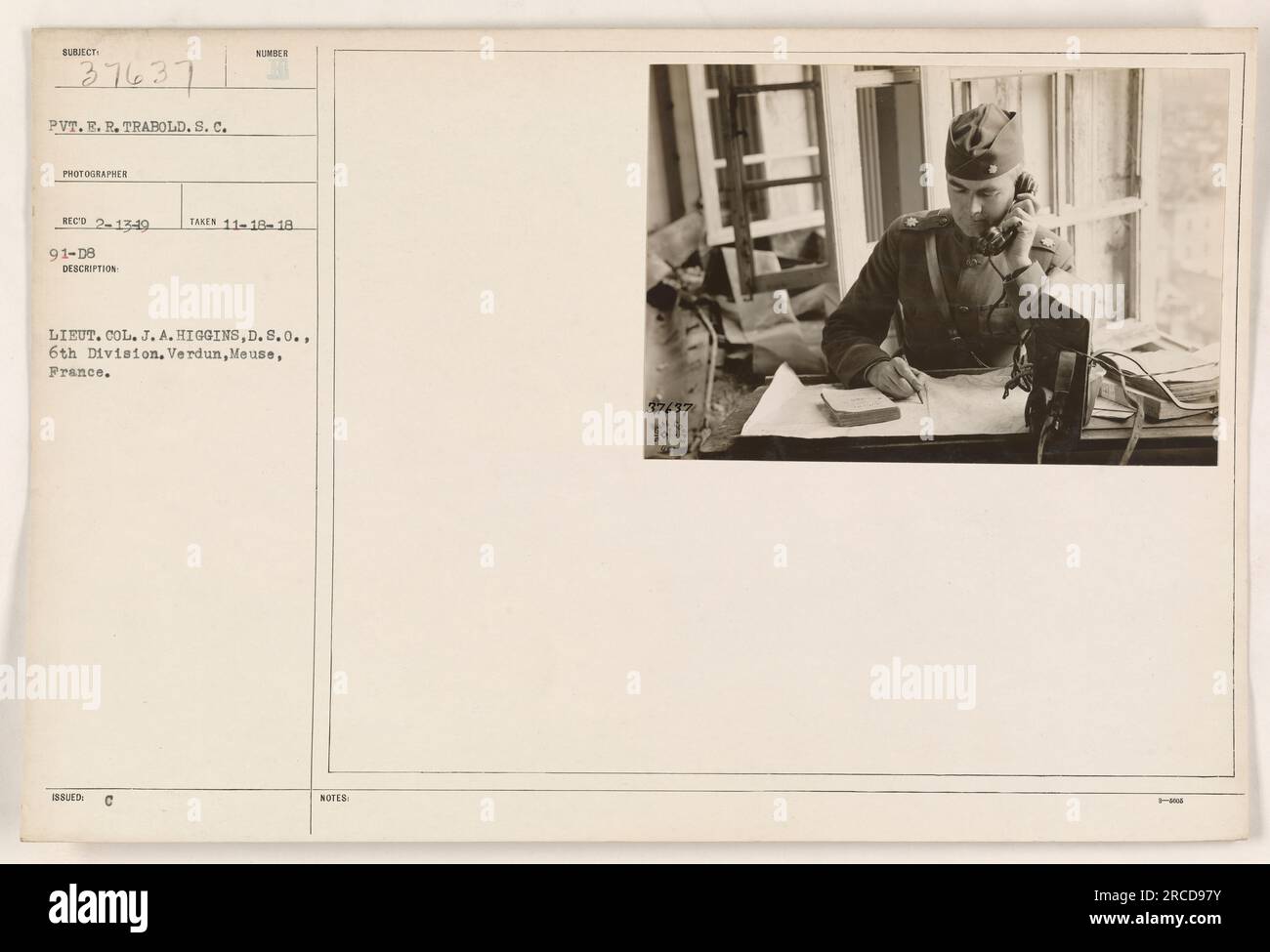 Private E.R. Trabold, a photographer from the Signal Corps, captures a ...