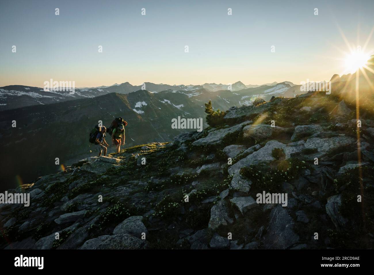 Two mountain climbers hiking hi-res stock photography and images - Alamy