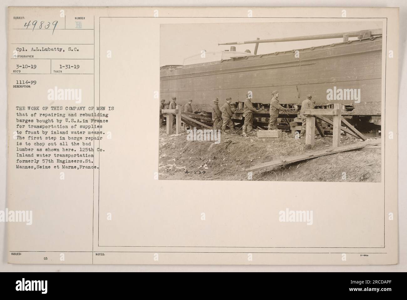 A group of men from the 125th Company, Inland Water Transportation ...