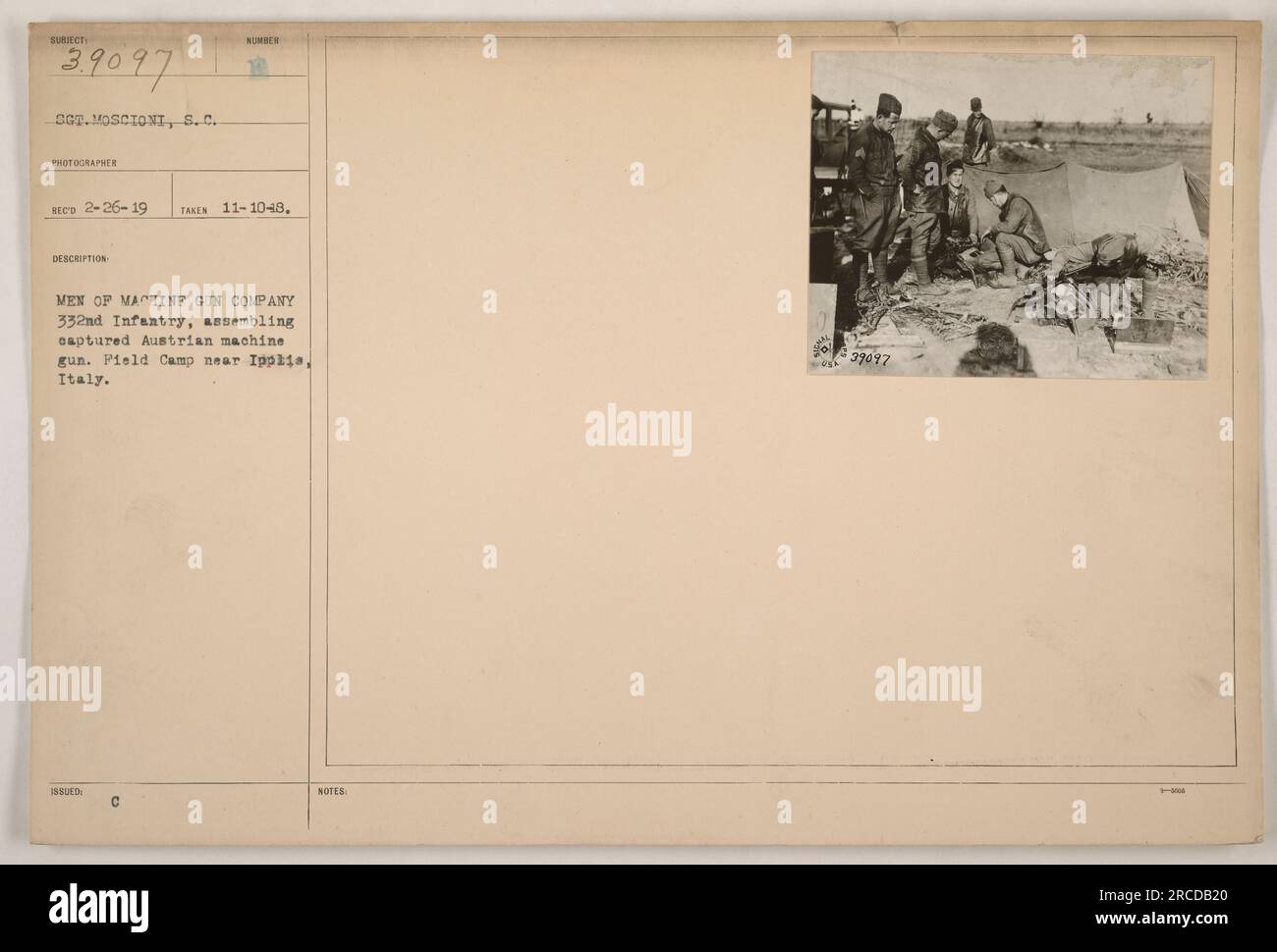 Soldiers from the Machine Gun Company of the 332nd Infantry are seen ...