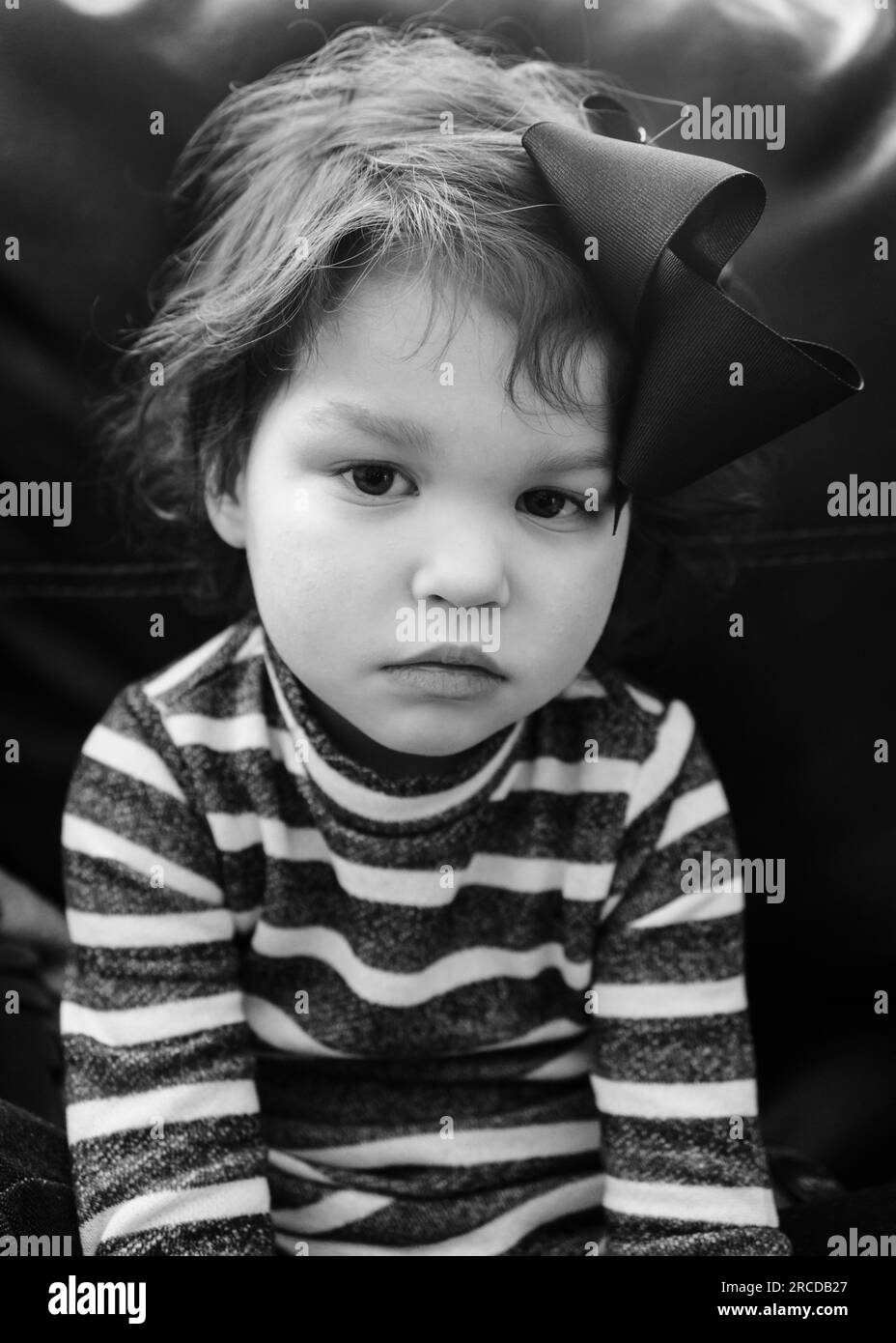 little girl with big bow portrait Stock Photo - Alamy