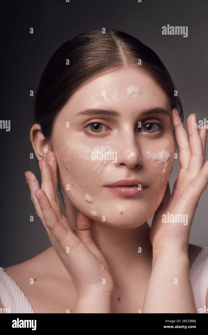 Face Skin Care Woman Applying A Mask On Clean Hydrated Skin Portrait