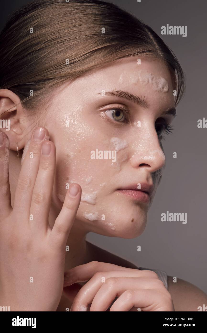 Face Skin Care Woman Applying A Mask On Clean Hydrated Skin Portrait