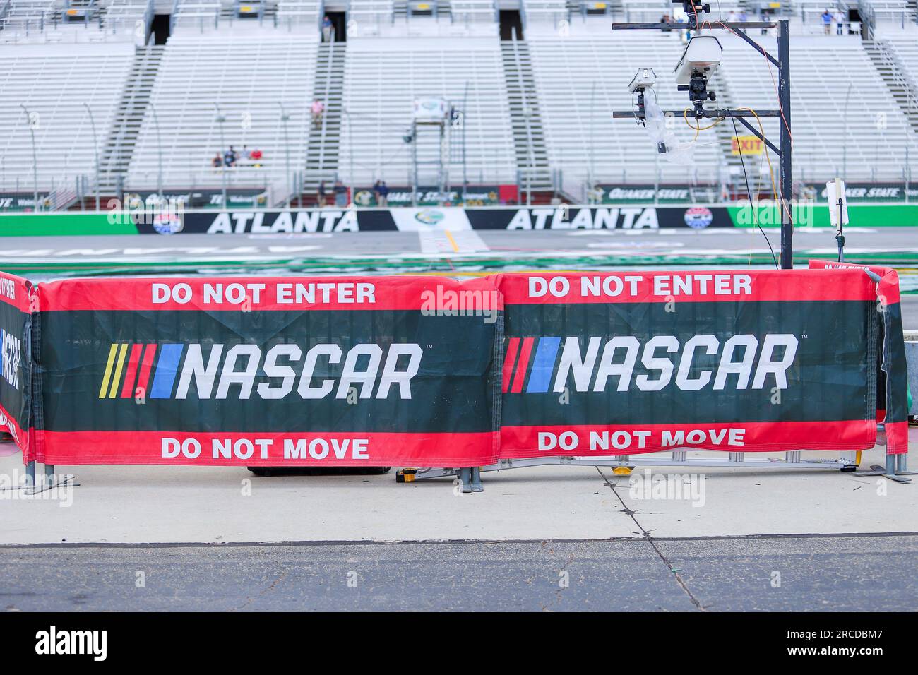 ATLANTA, GA - JULY 09: NASCAR logos on a barricade on pit row before ...