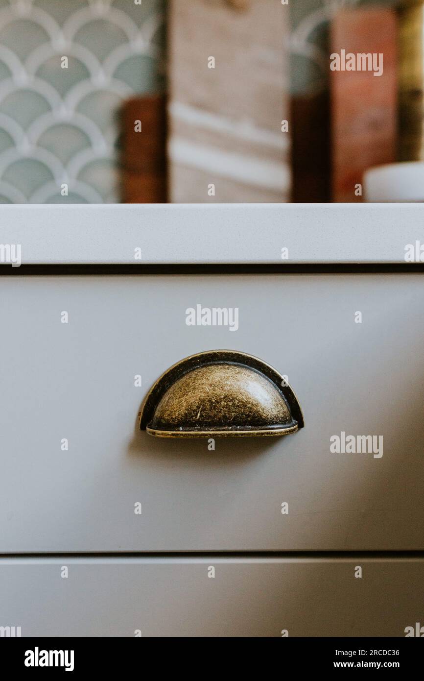 Kitchen design details brass pull Stock Photo - Alamy