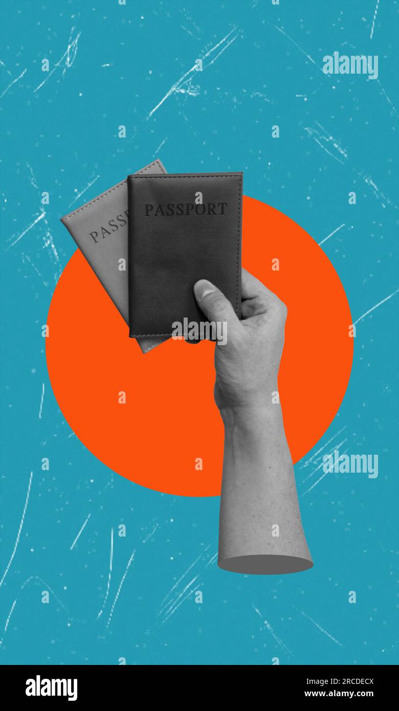 Art collage, hand with two passports on blue background with copying ...