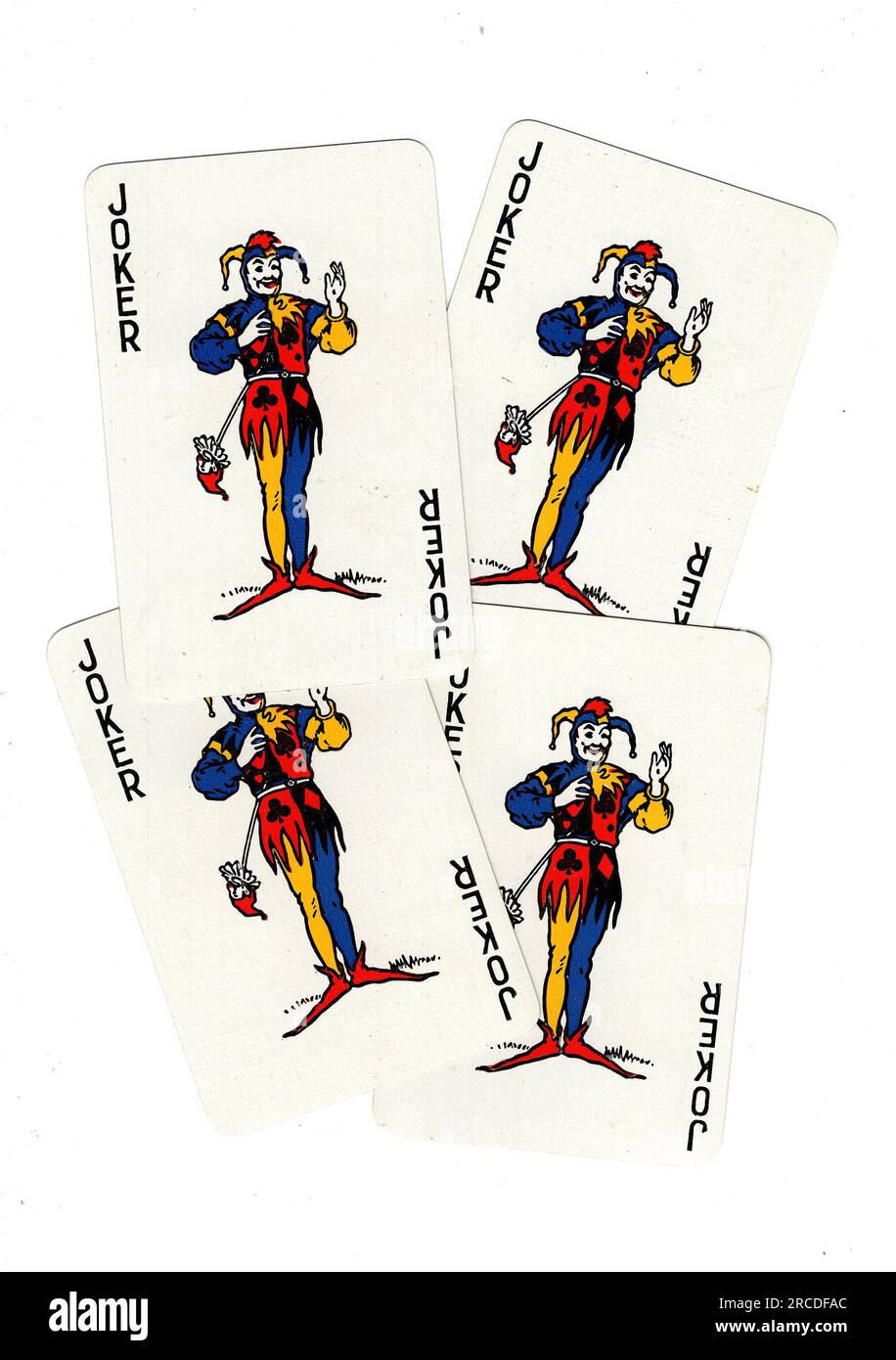 Vintage playing cards showing four jokers on a white background Stock ...