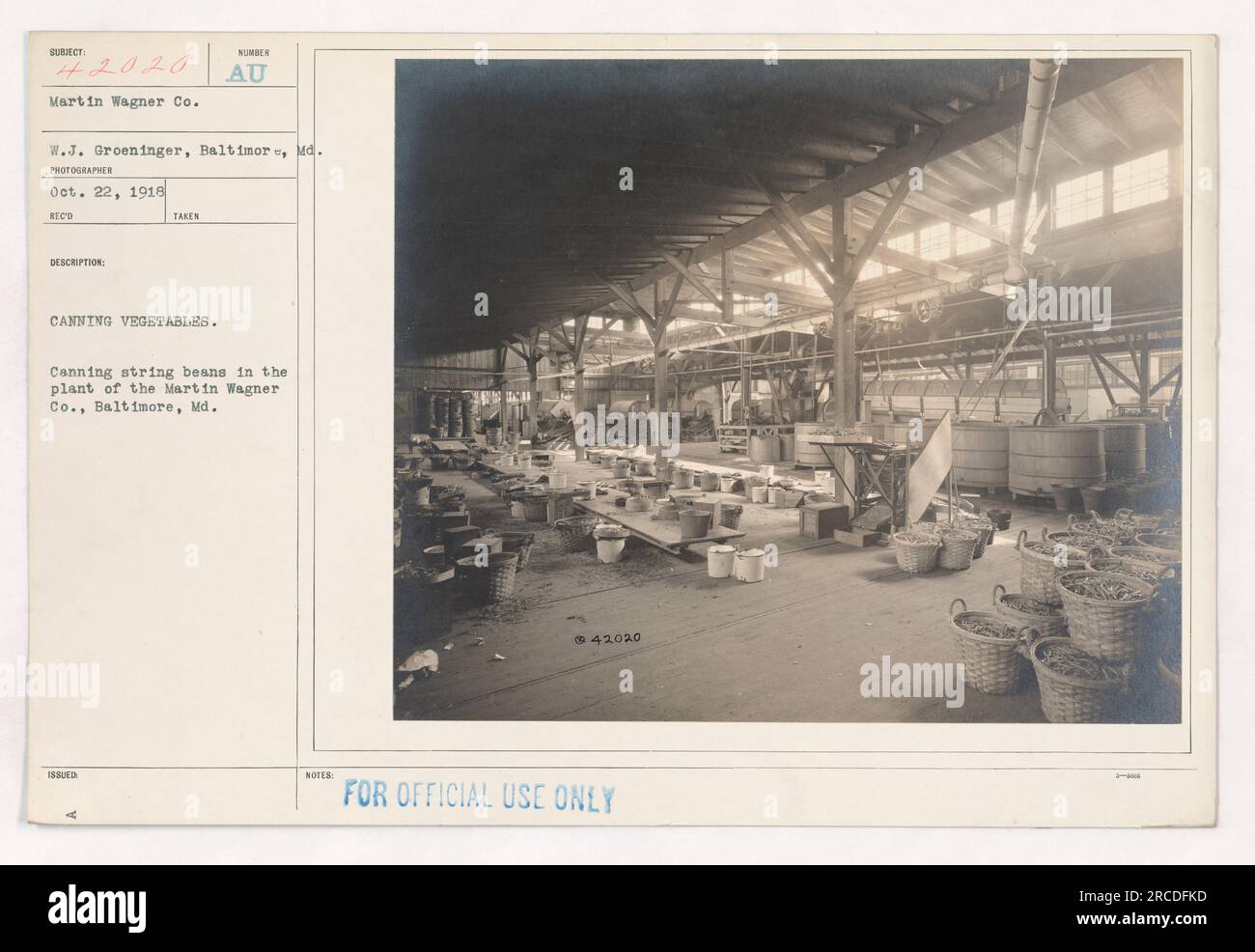 Workers of the Martin Wagner Co. in Baltimore, Maryland, are seen ...