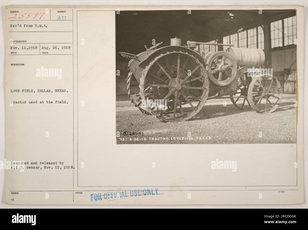 The image shows a tractor being used at Love Field in Dallas, Texas ...