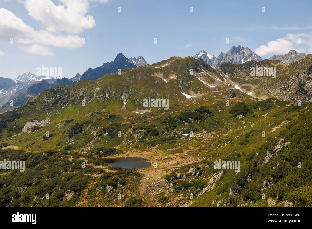 Sunniggrathütte SAC and surrounding mountains in Urner Alpen in summer ...