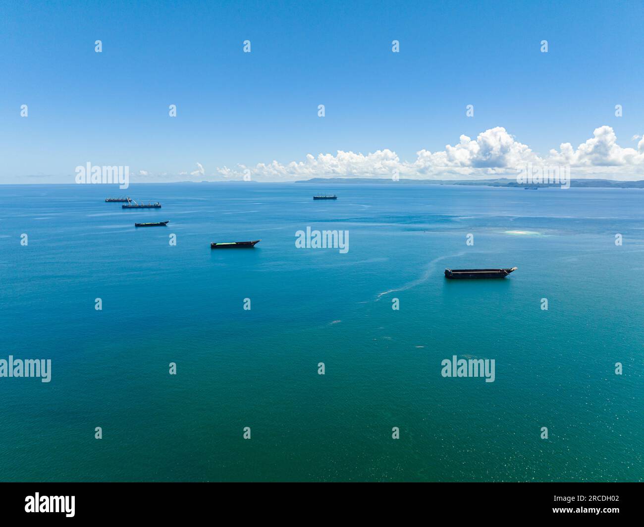 Sea bay with cargo and merchant ship. Seascape. Mindanao, Philippines ...