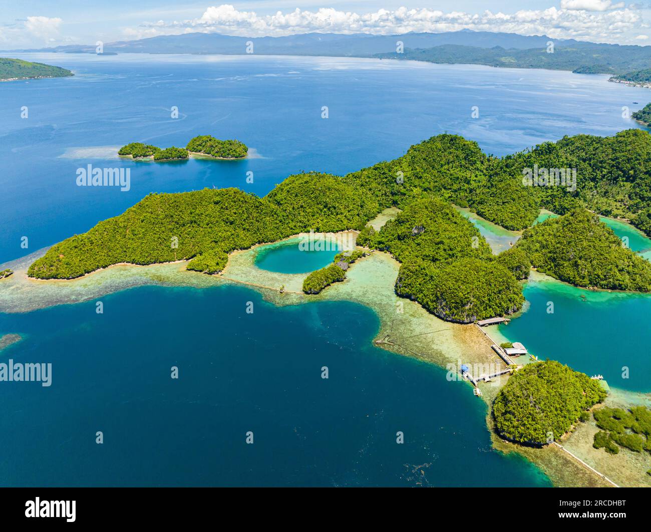 Beautiful deep blue sea water and lagoons of Tropical Island. Sandy ...