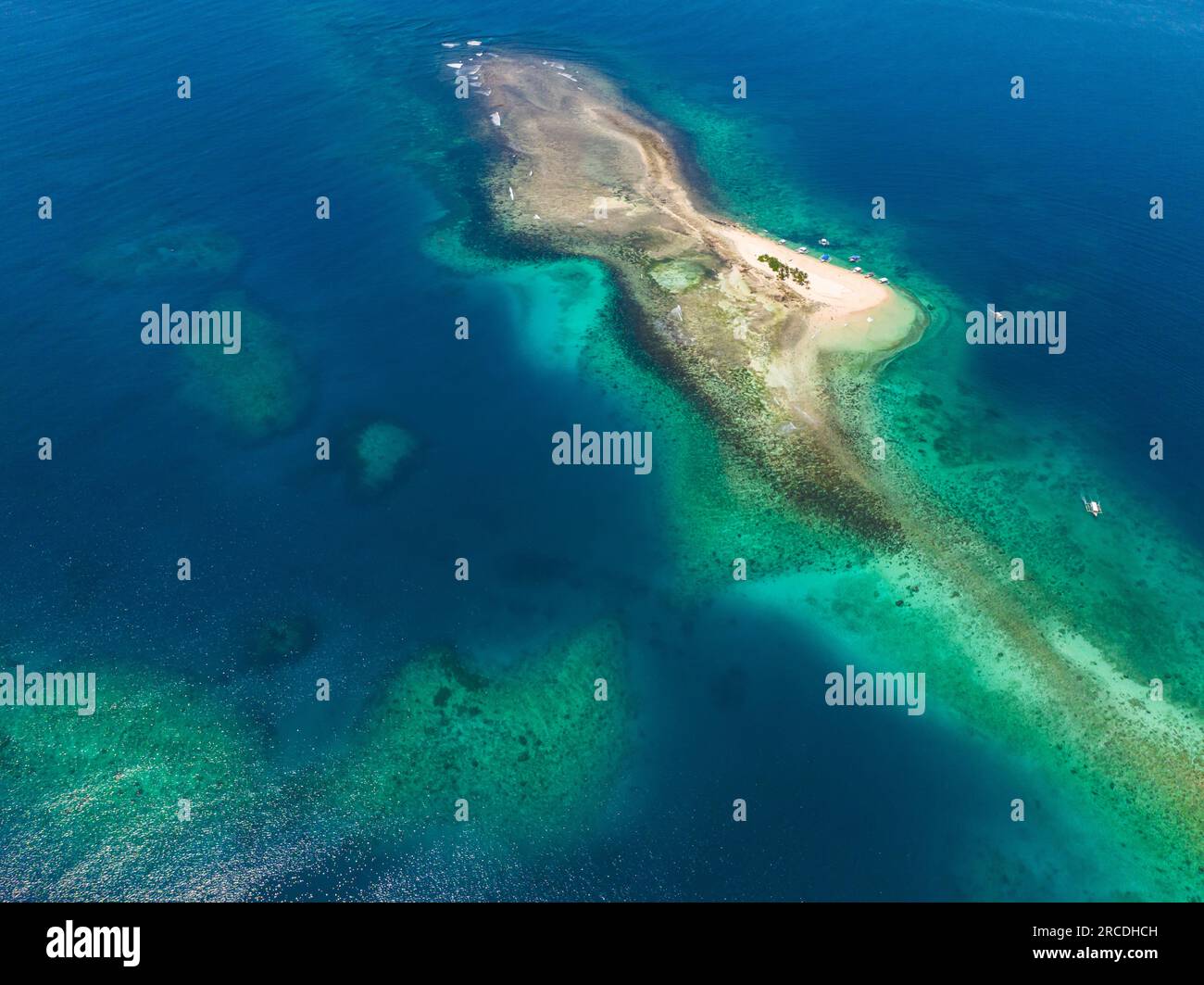 Air survey of Beautiful sandy beach with palm trees in Hagonoy Island ...