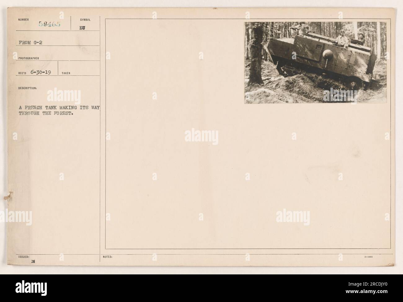 A French tank moving through a forest during World War One. This ...