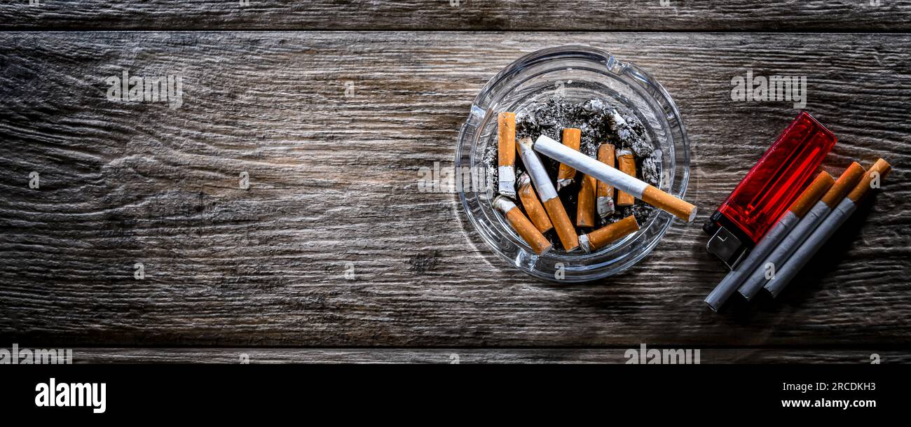 Composition with an ashtray and cigarettes Stock Photo - Alamy
