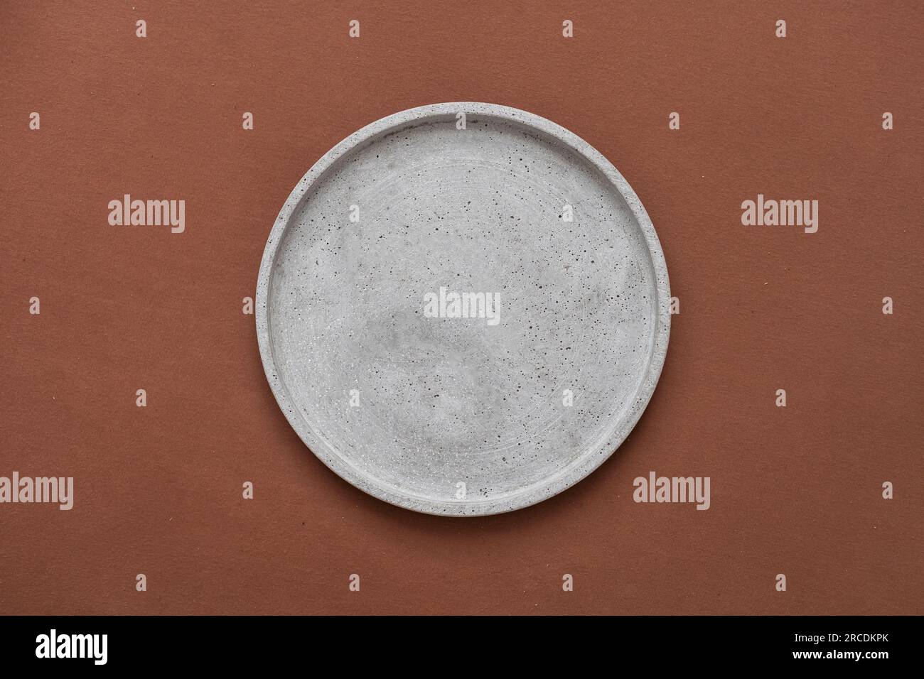 Gray ceramic plate isolated on white background Stock Photo - Alamy