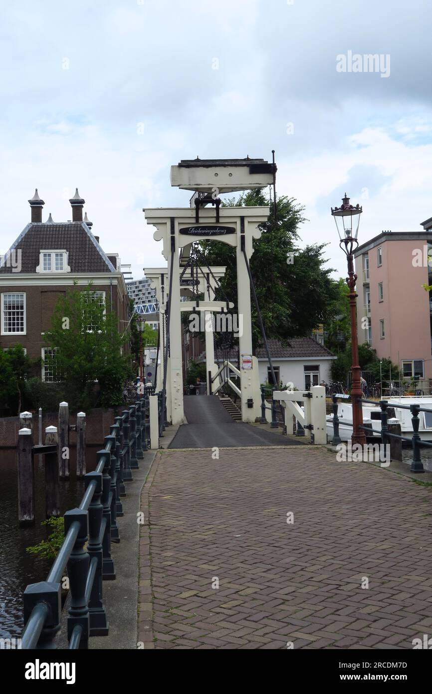 Drieharingenbrug, a double drawbridge in Amsterdam, The Netherlands. It ...