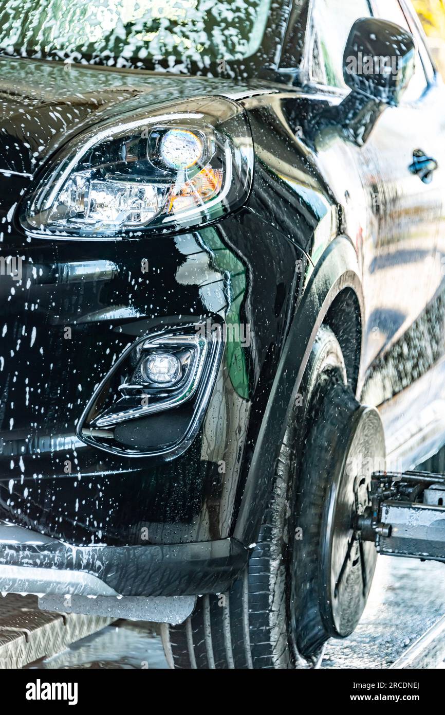 A motorcar in an automatic car wash Stock Photo - Alamy
