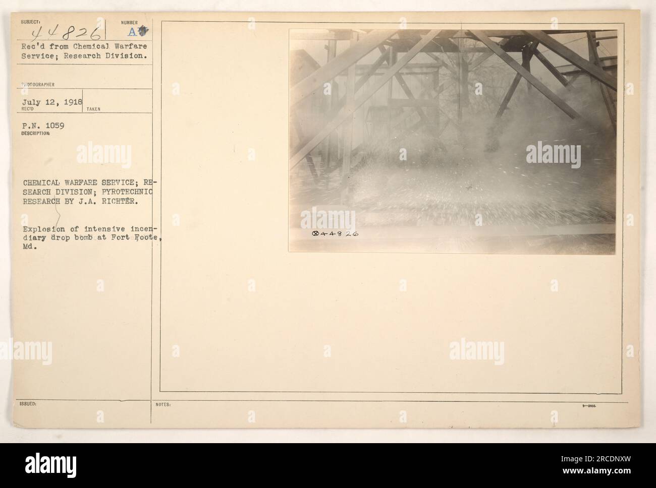 Caption: "Photograph showing the explosion of an intensive incendiary ...