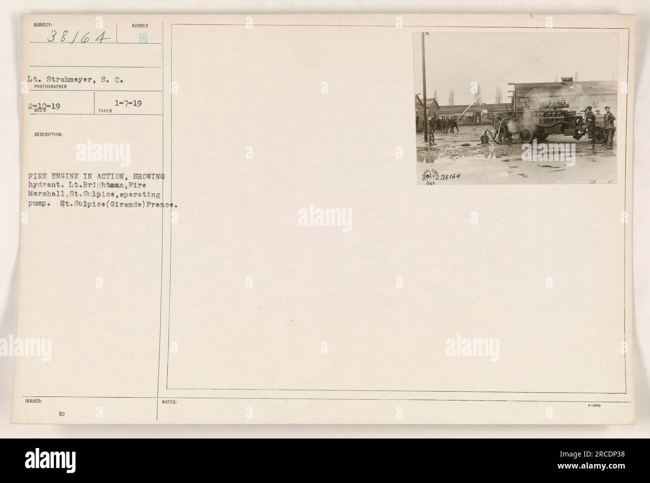 A fire engine in action, showing a hydrant. Lieutenant Strohmeyer and ...