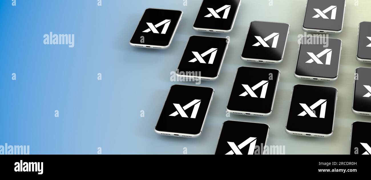 Logos of the AI startup xAI by Elon Musk on mobile phones hovering over ...
