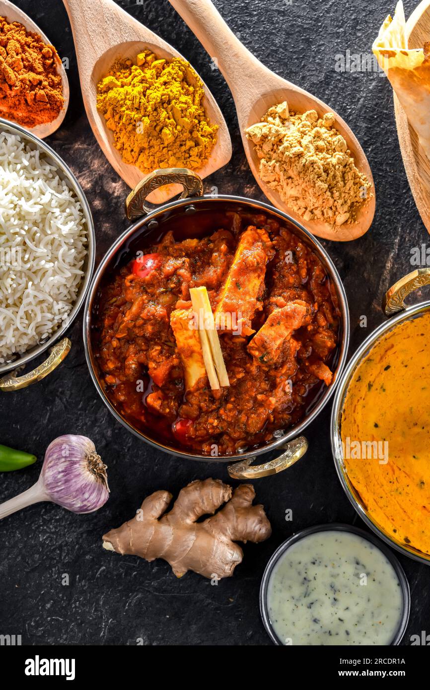 Composition with indian dishes: madras paneer, palak paneer and shahi ...