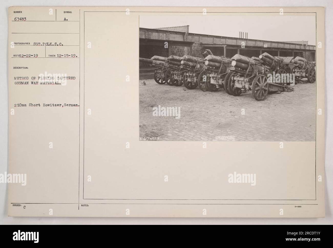 A captured German 210mm Short Howitzer being parked using a specific ...