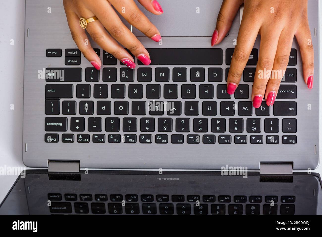 Hands typing laptop buttons computer technology Stock Photo - Alamy