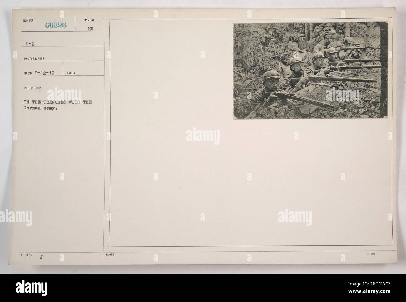 Soldiers from the German army take cover in the trenches during World ...