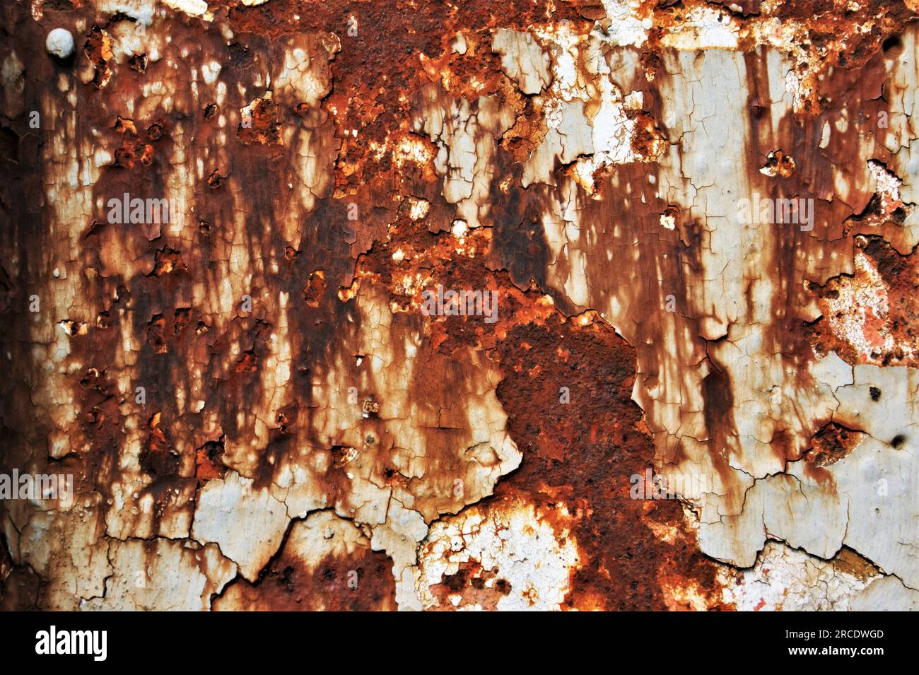 Metal Corrosion. Texture cracked paint on an iron sheet. Metal rusty ...