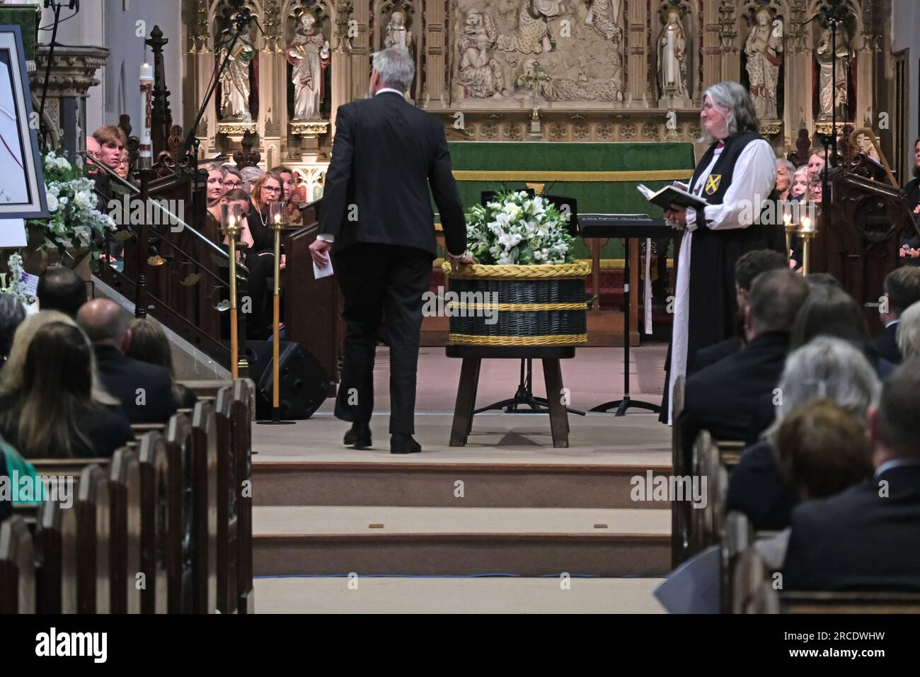 David Webber, the father of Barnaby Webber, touches his coffin as he ...