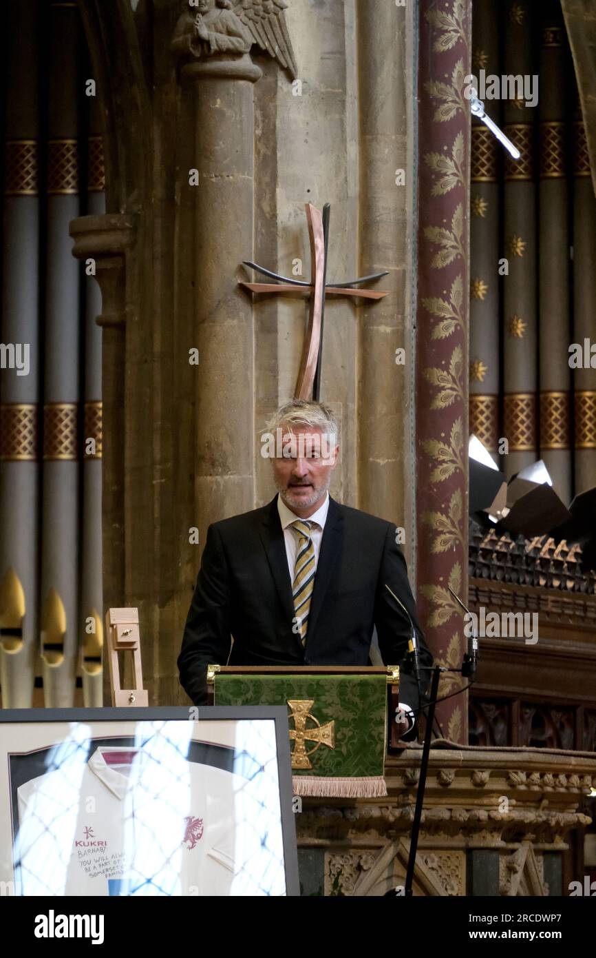 David Webber, the father of Barnaby Webber, gives a reading during his ...