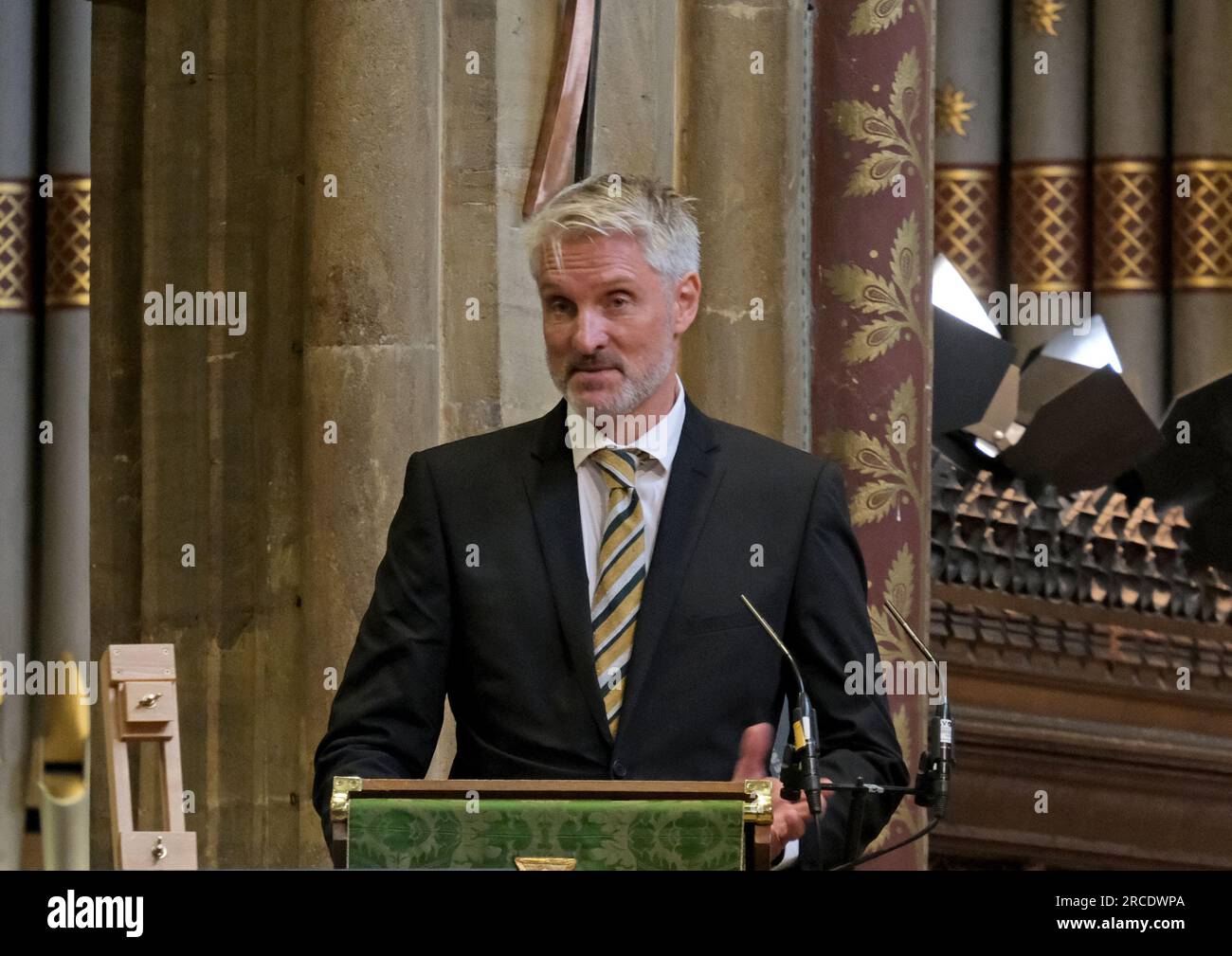 David Webber, the father of Barnaby Webber, gives a reading during his ...