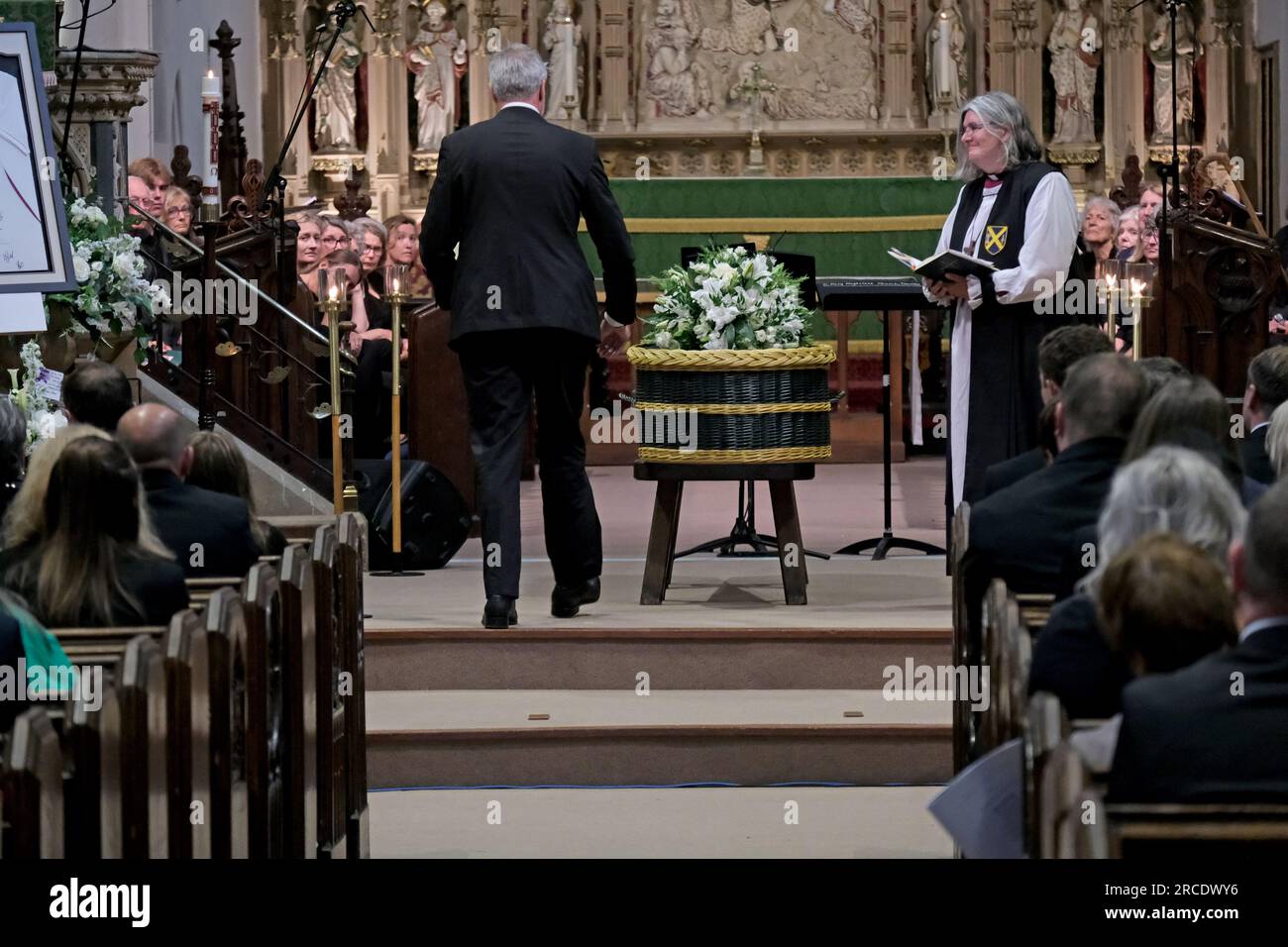 David Webber, the father of Barnaby Webber, walks past his coffin ...