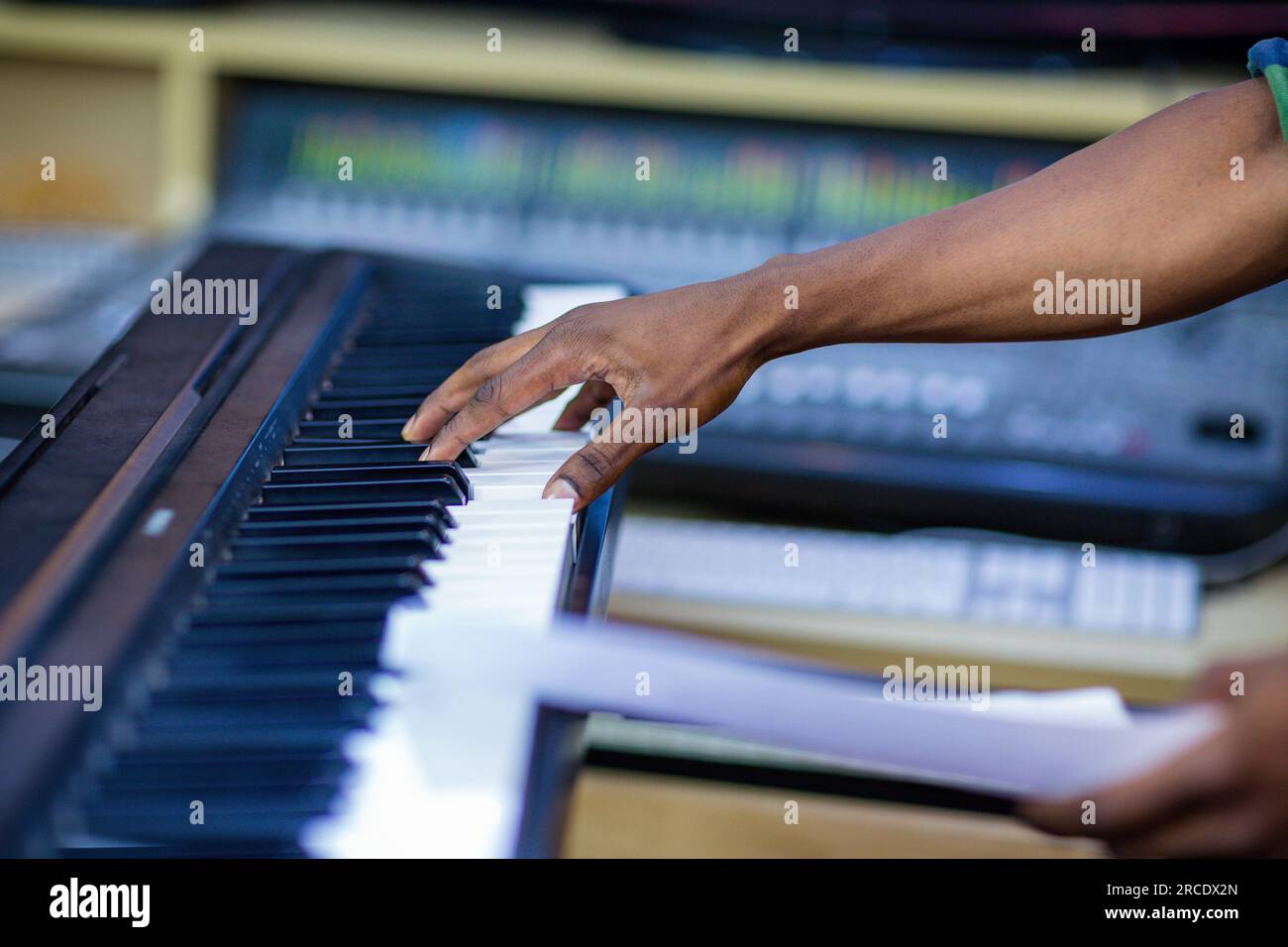 Hands pressing playing keyboard piano buttons Musical sound instruments ...