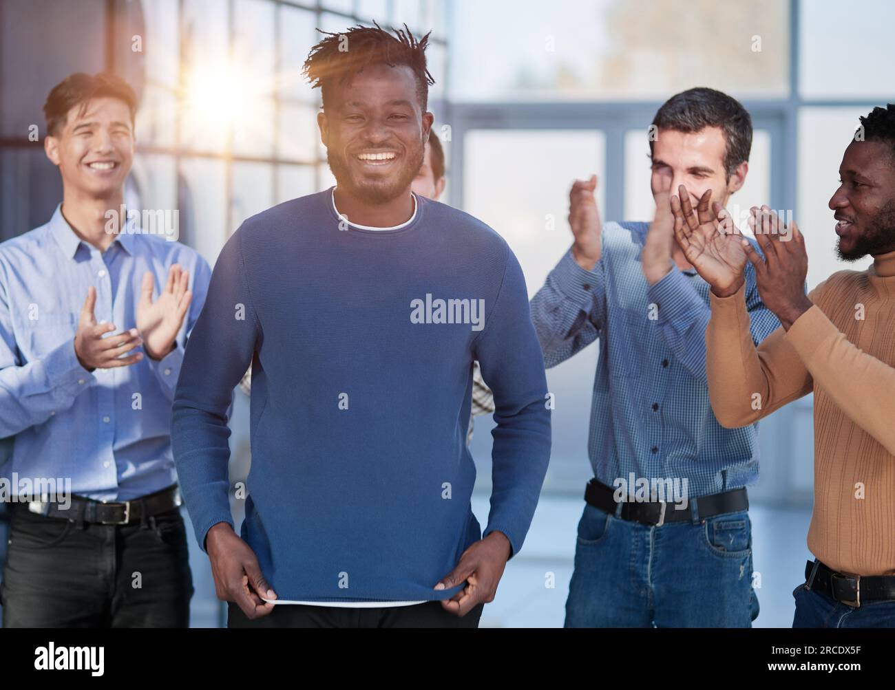 happy multiracial colleagues coworkers celebrate business success together Stock Photo - Alamy