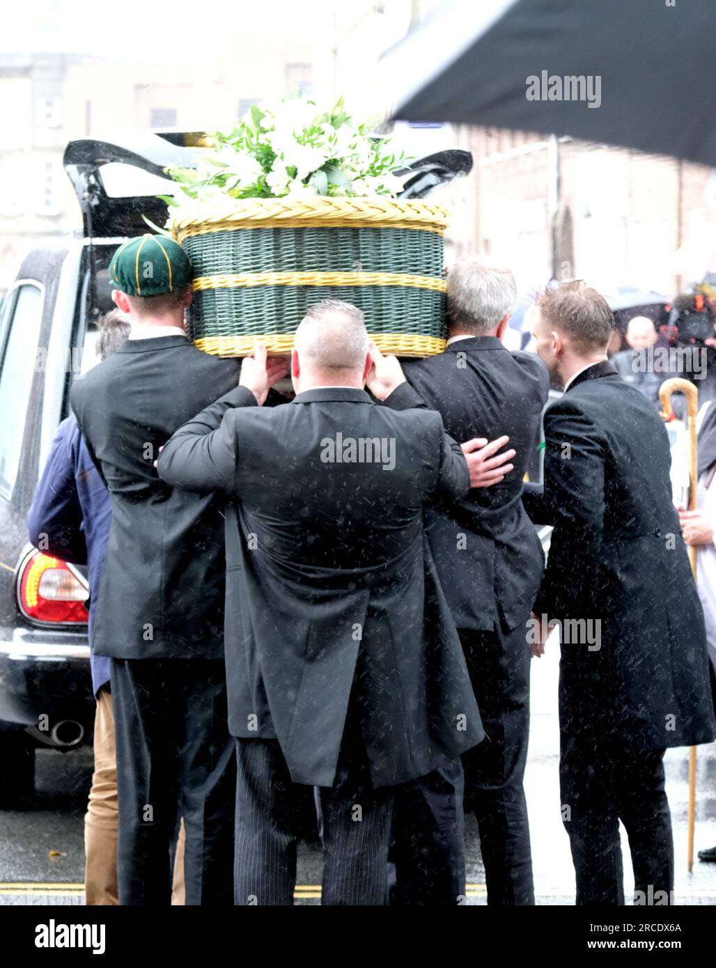 The coffin of Barnaby is carried from his funeral of at Taunton Minster ...